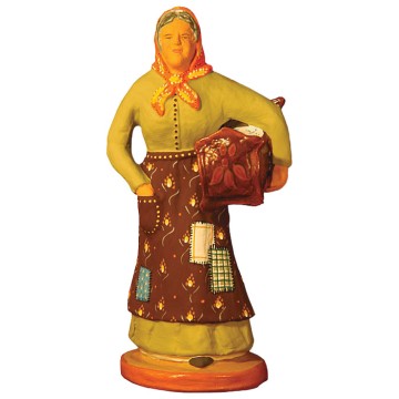 Woman carrying a cradle