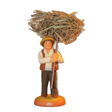 Man with bundle of Hay