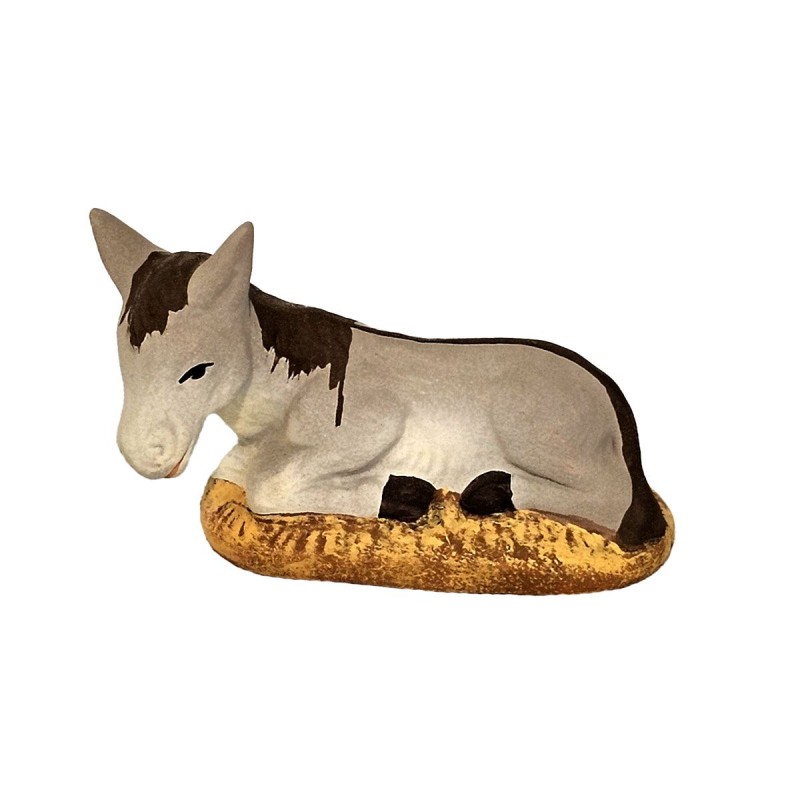 Donkey laying on strow